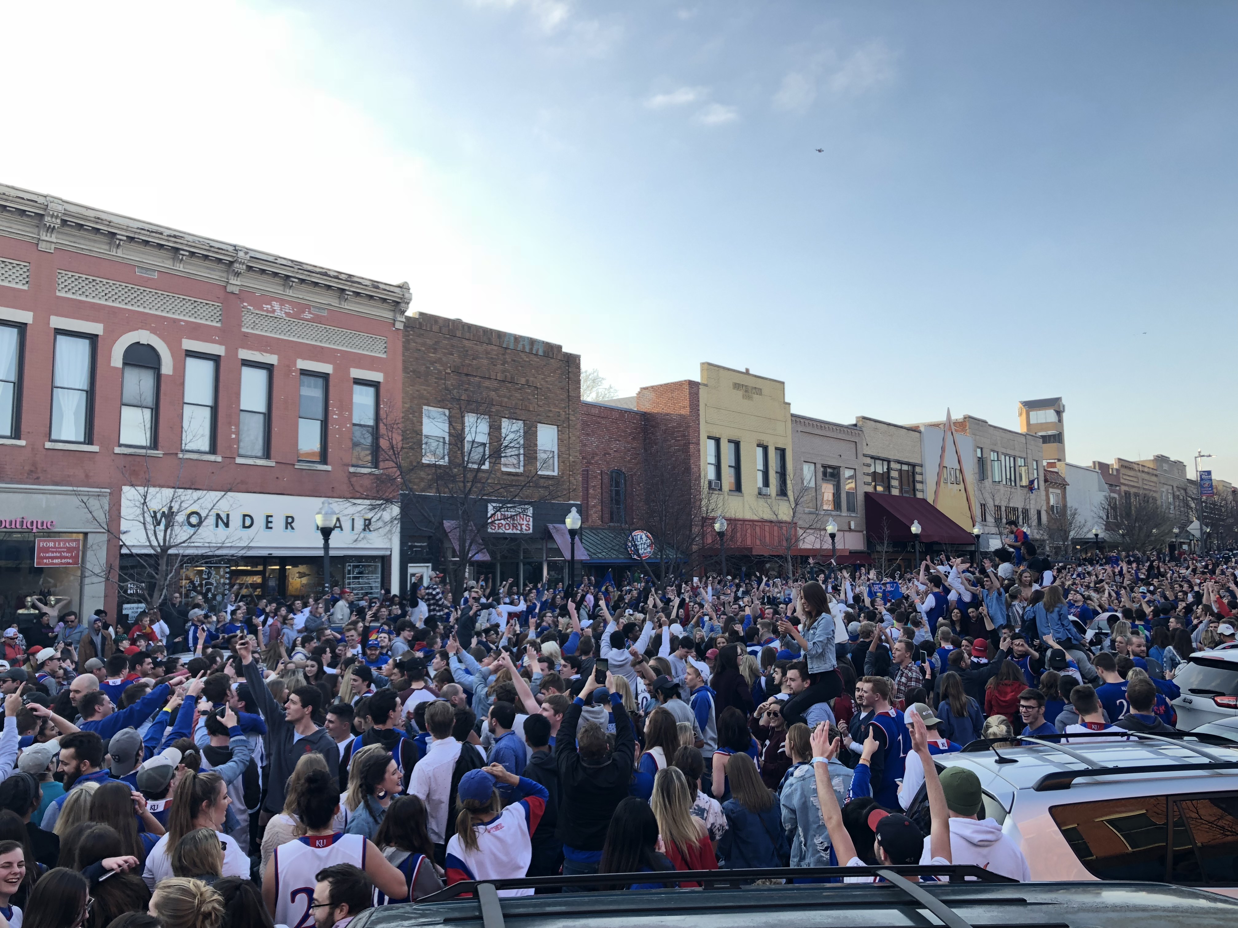 Jayhawk fans release Elite Eight tension with party on Massachusetts ...